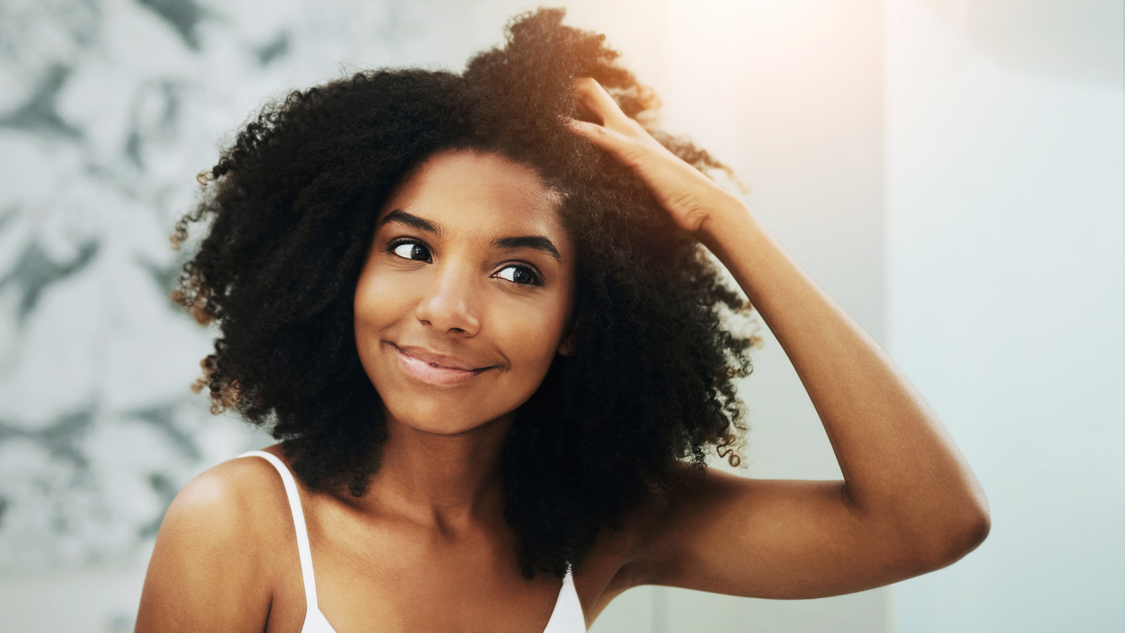 4 Gel Methods For Curly-Haired Girls, As Recommended By Our Expert