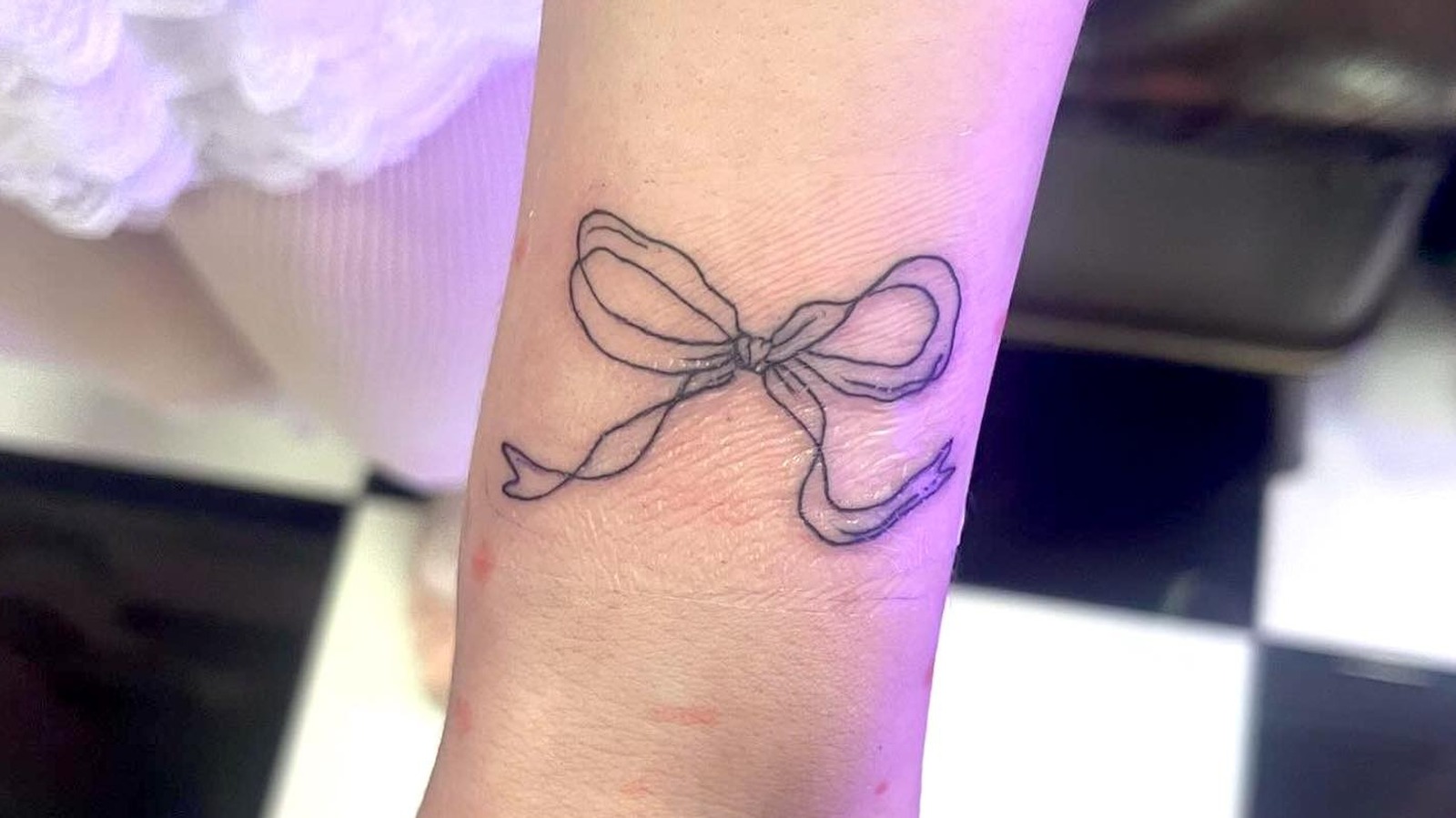 Bow Tattoos Are One Of 2024's Biggest Ink Trends