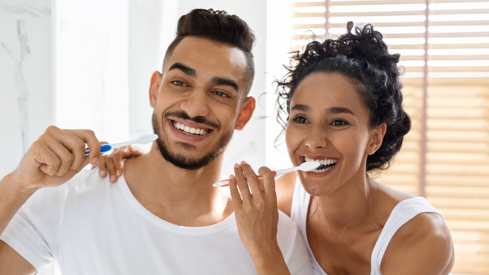 Why You And Your Partner Should Brush Your Teeth Before Locking Lips